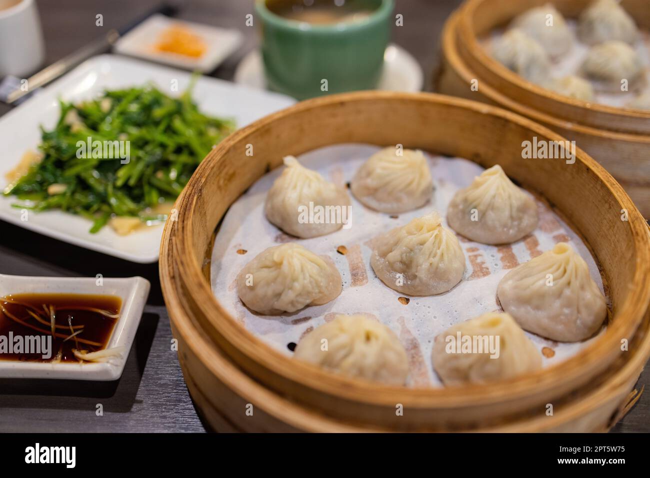 Chinese style steamed soup bun in restaurant Stock Photo - Alamy