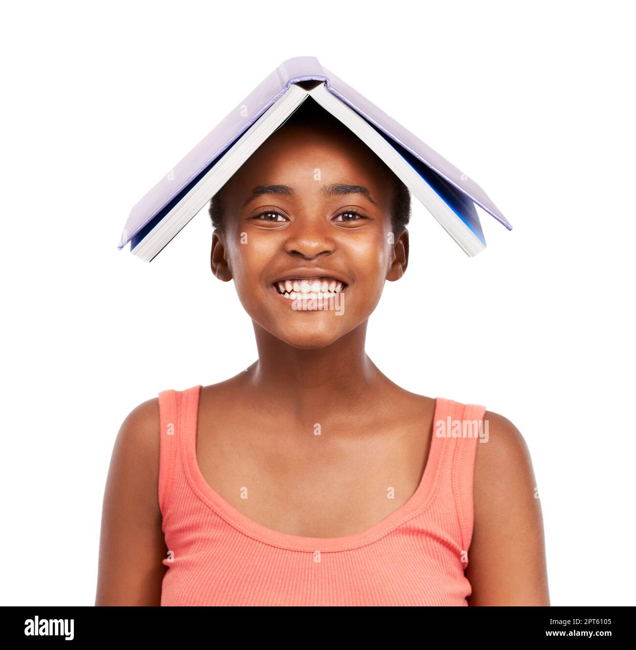 Children balancing book on head hi-res stock photography and images - Alamy