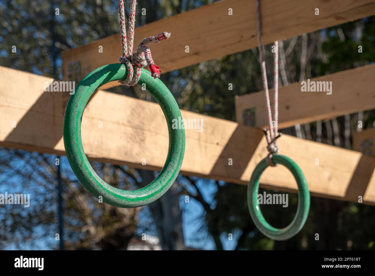 detail of the rings of one of the tests in an obstacle course race, ocr ...