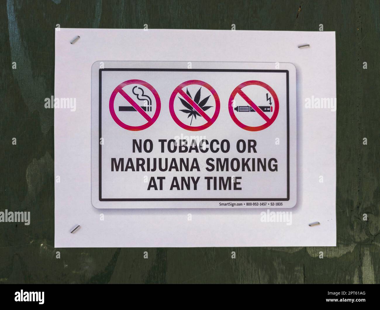 Sign prohibiting smoking, both cigarettes and marijuana and vaping at a ...