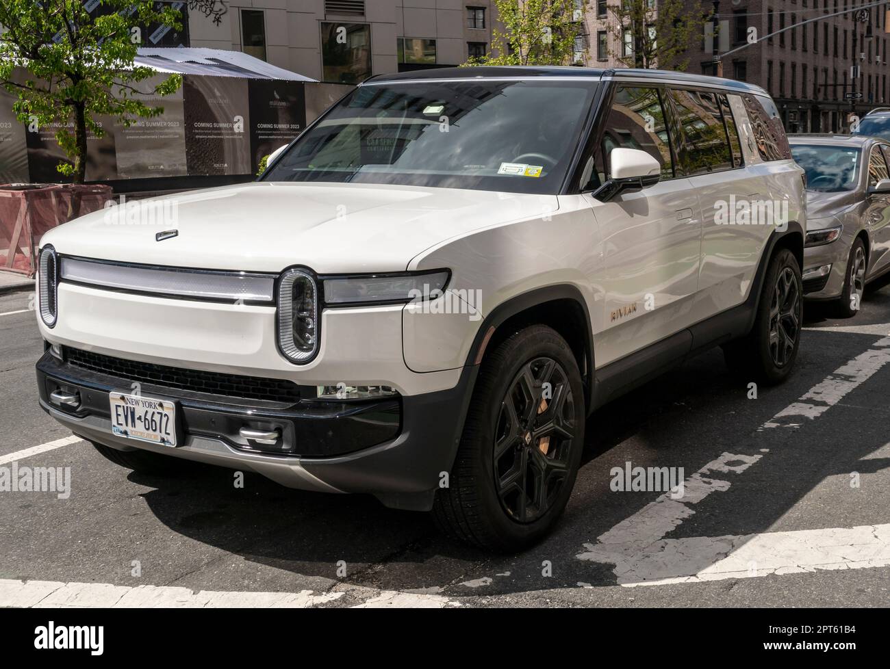 A Rivian Automotive R1S sport utility vehicle is parked in the ...