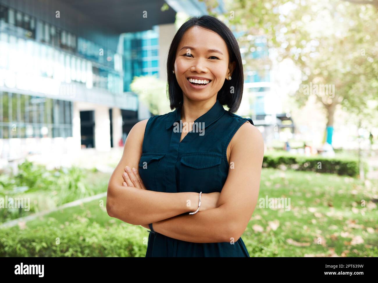 Happy, nature and portrait of a Japanese businesswoman outdoors during ...