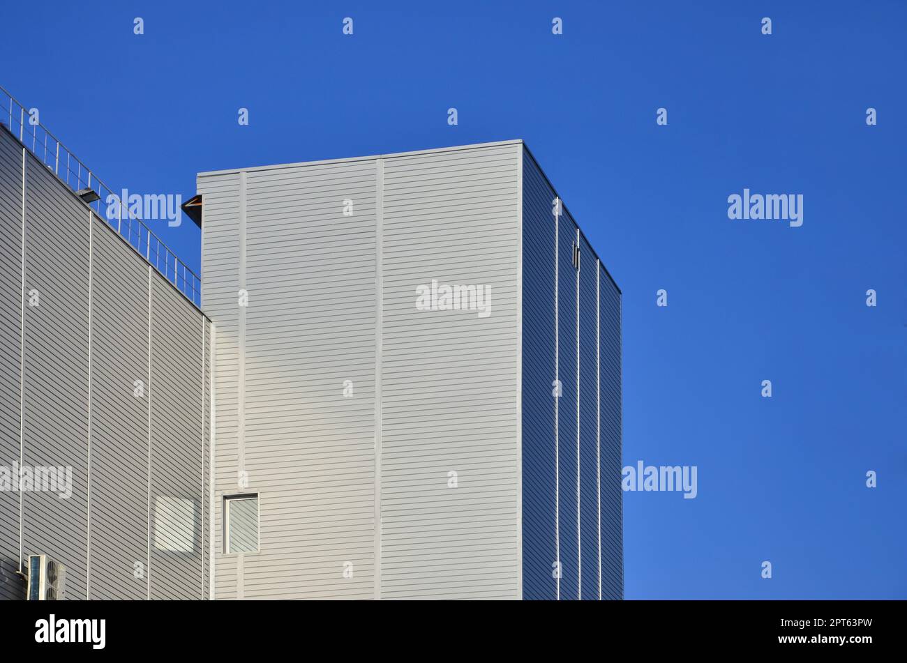 Photo of industrial high-rise building with perfect quality siding in ...