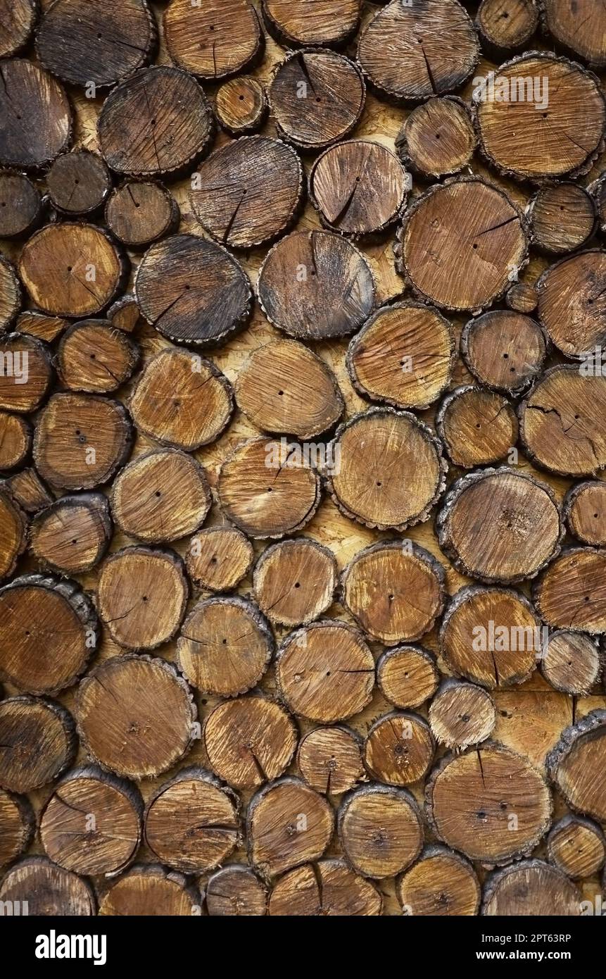 Decorative fence of wooden blocks. Rare wooden handmade wall contains ...