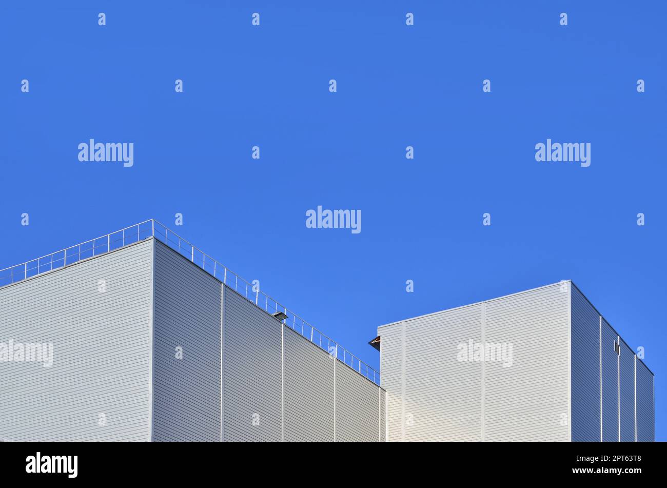 Photo of industrial high-rise building with perfect quality siding in ...