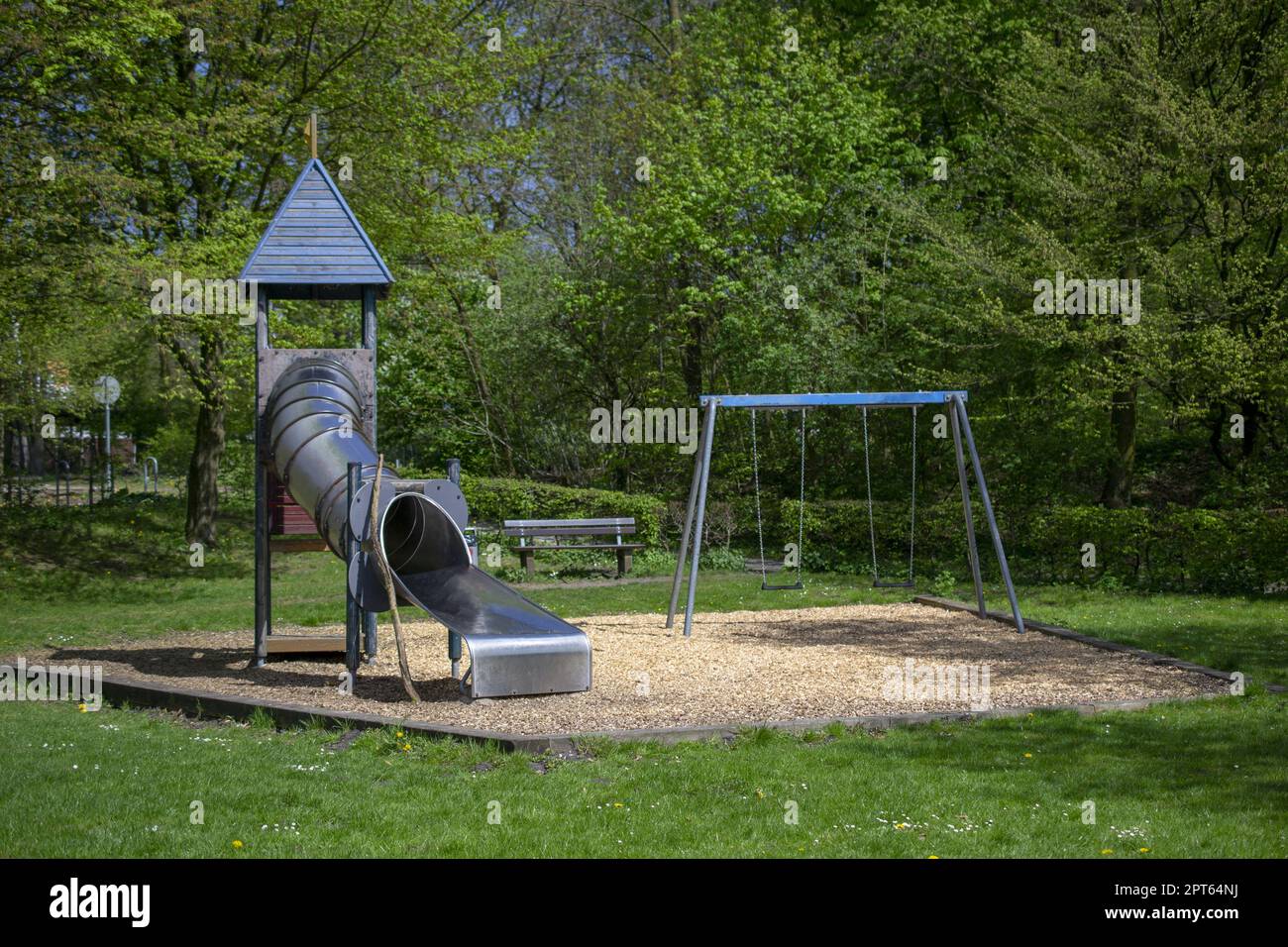 children's playground with slide at a park Stock Photo - Alamy