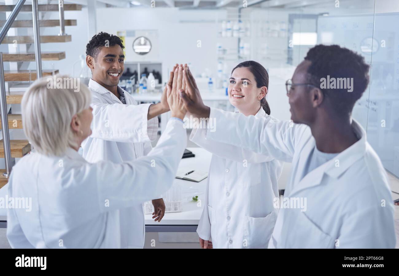 Diverse scientists group success hi-res stock photography and images ...