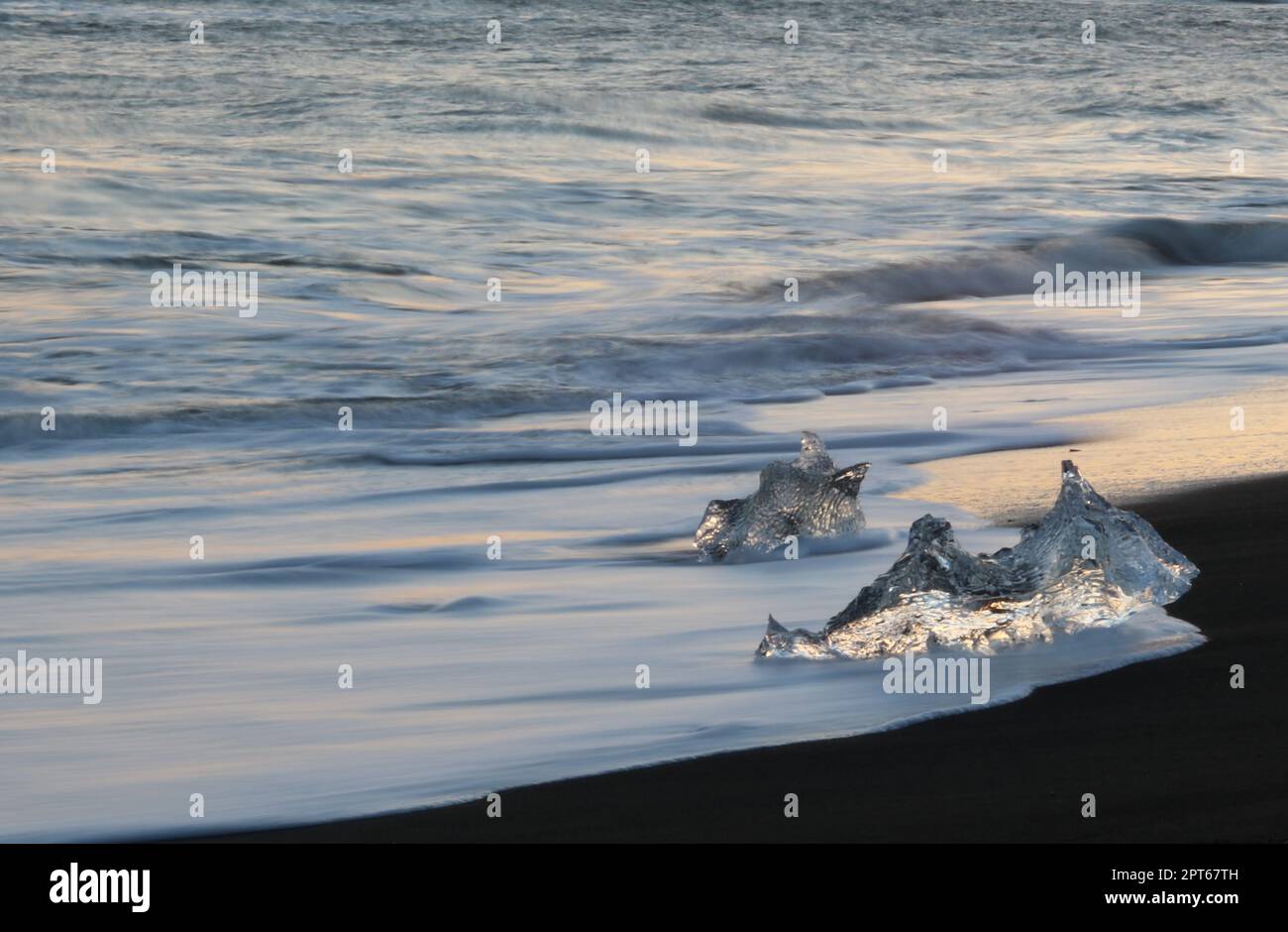 Broken iceberg pieces on the Diamond Beach in Iceland Stock Photo - Alamy