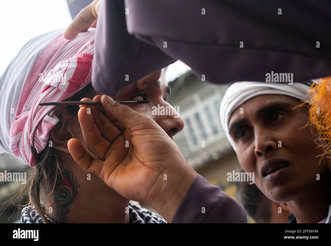 Guwahati, India. 22 April 2023. A Muslim man applies Surma on eyes ...