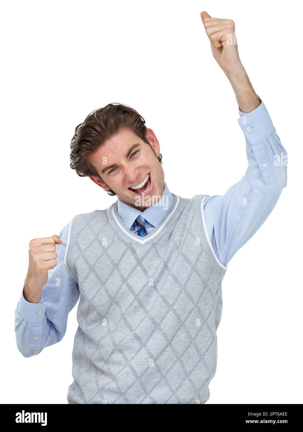 Oh yes. A young man celebrating while isolated on a white background ...