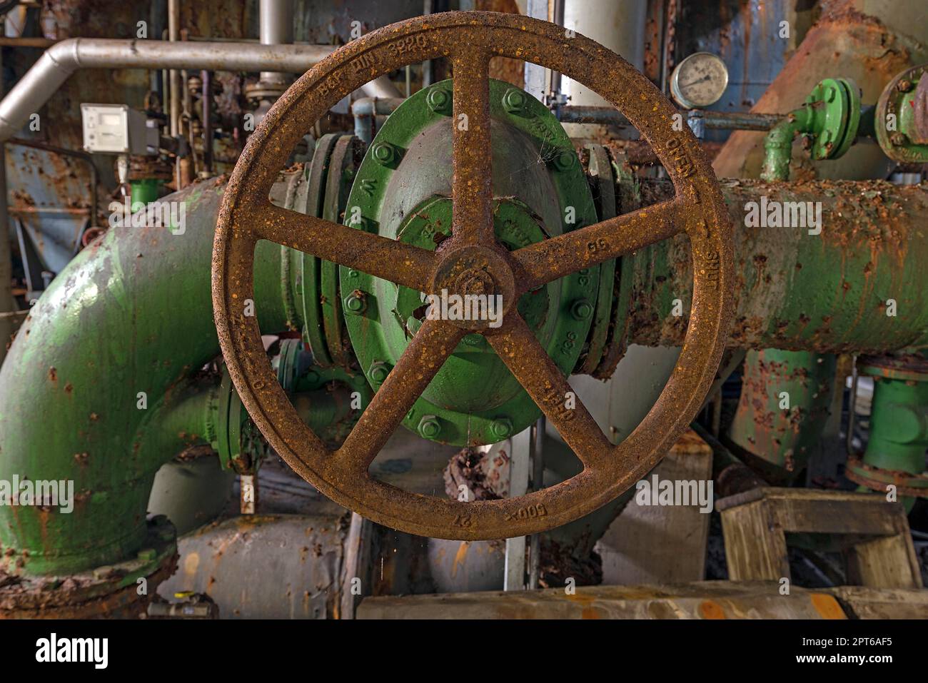 Rusty shut-off wheel on a water pipe of a former paper factory, Lost ...