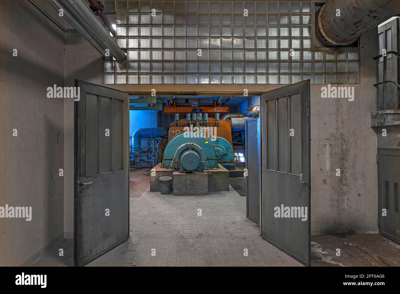 View into a hall with generator of a former paper factory, Lost Place ...