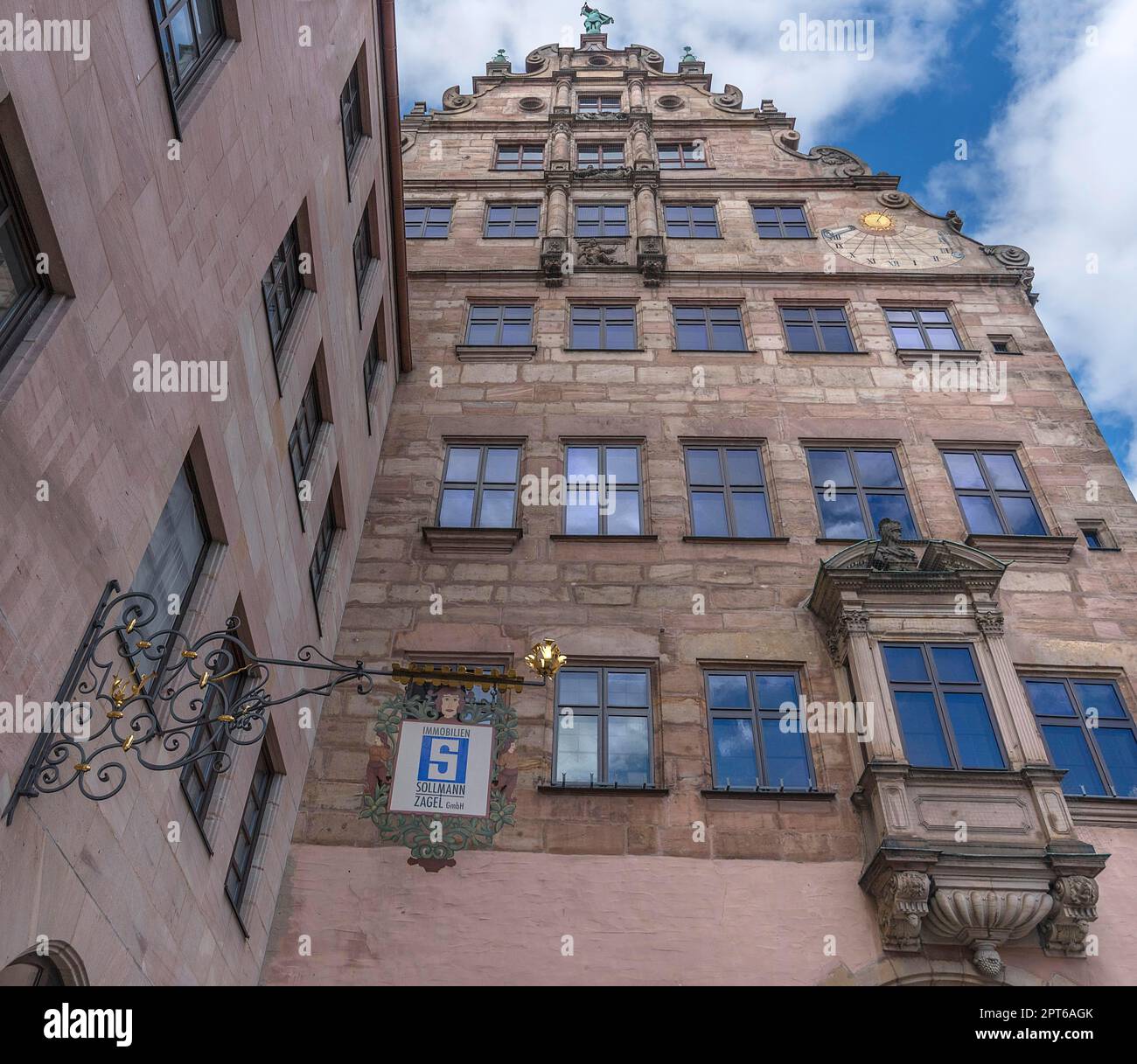 Historical nose sign on a residential and commercial building, in the ...
