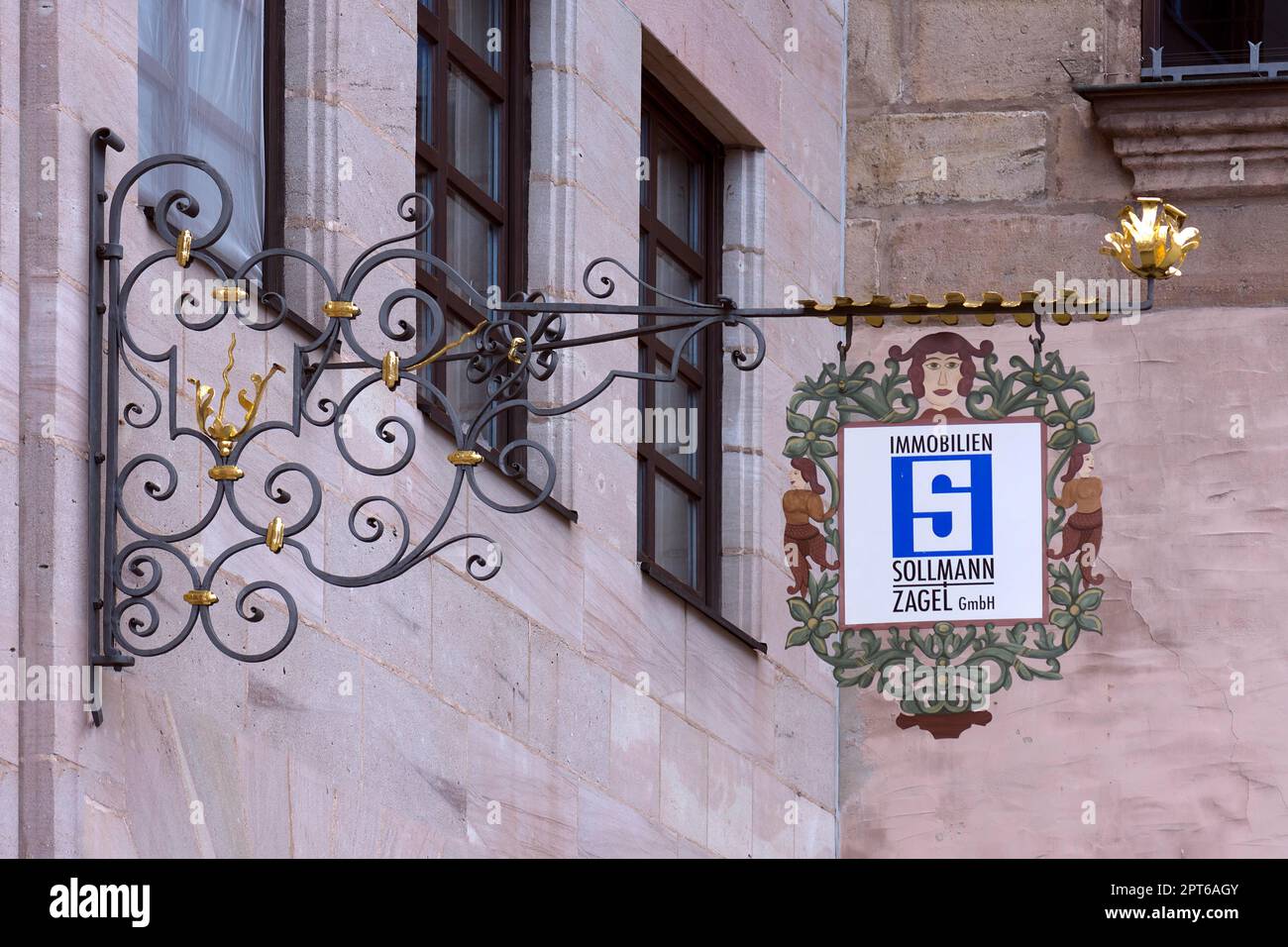 Historical nose sign on a residential and commercial building, Burgstr ...