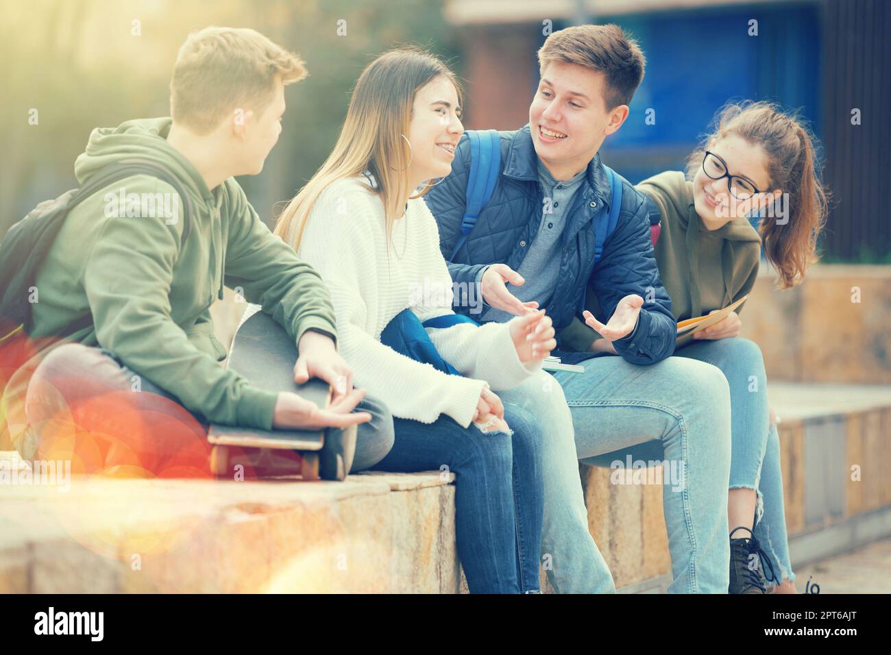Group of positive teenagers having fun together Stock Photo - Alamy