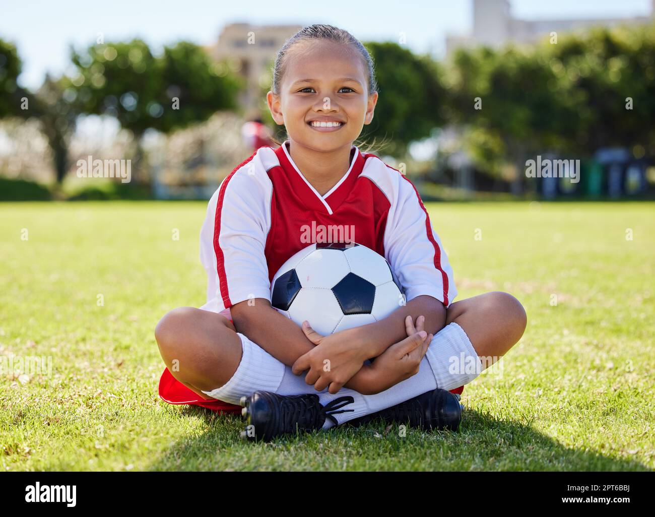 Sports, happy and girl. relax on soccer field after game, competition ...