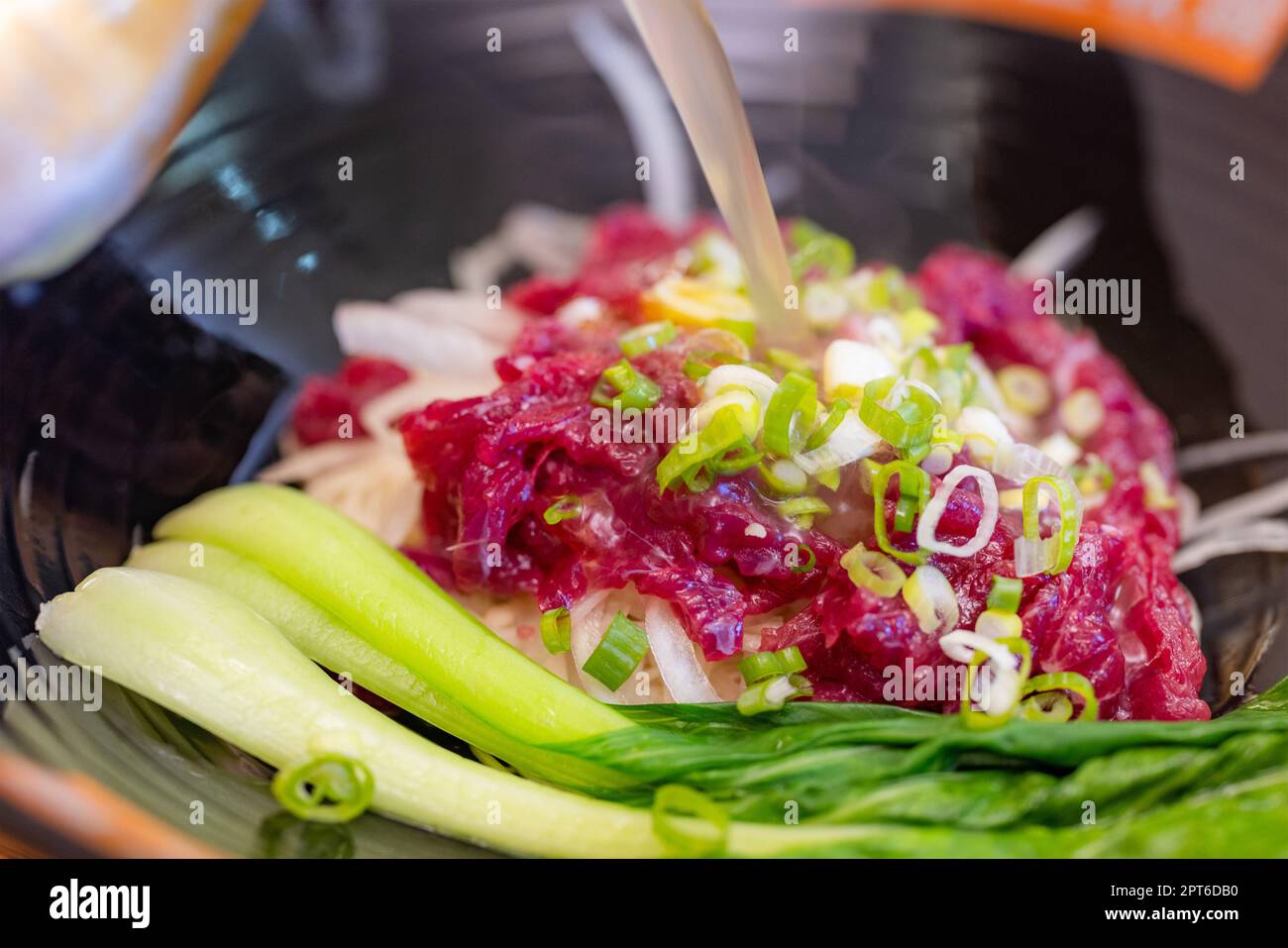 Noodle with slice of raw beef, famous cuisine in Kinmen of Taiwan Stock ...