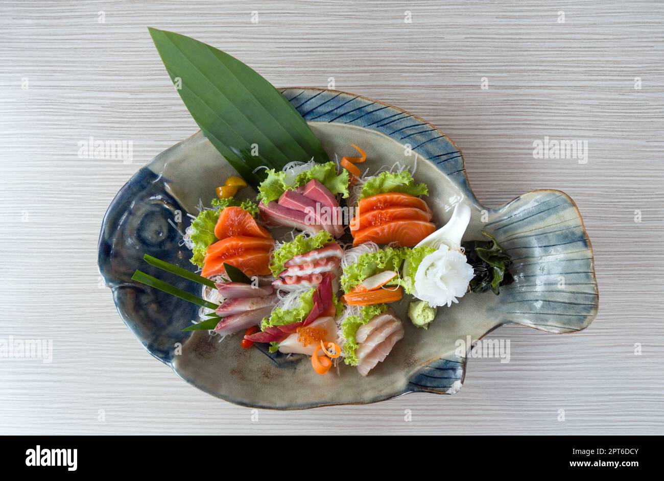 Sashimi mori, mix sashimi set served in ceramic plate decorated with ...