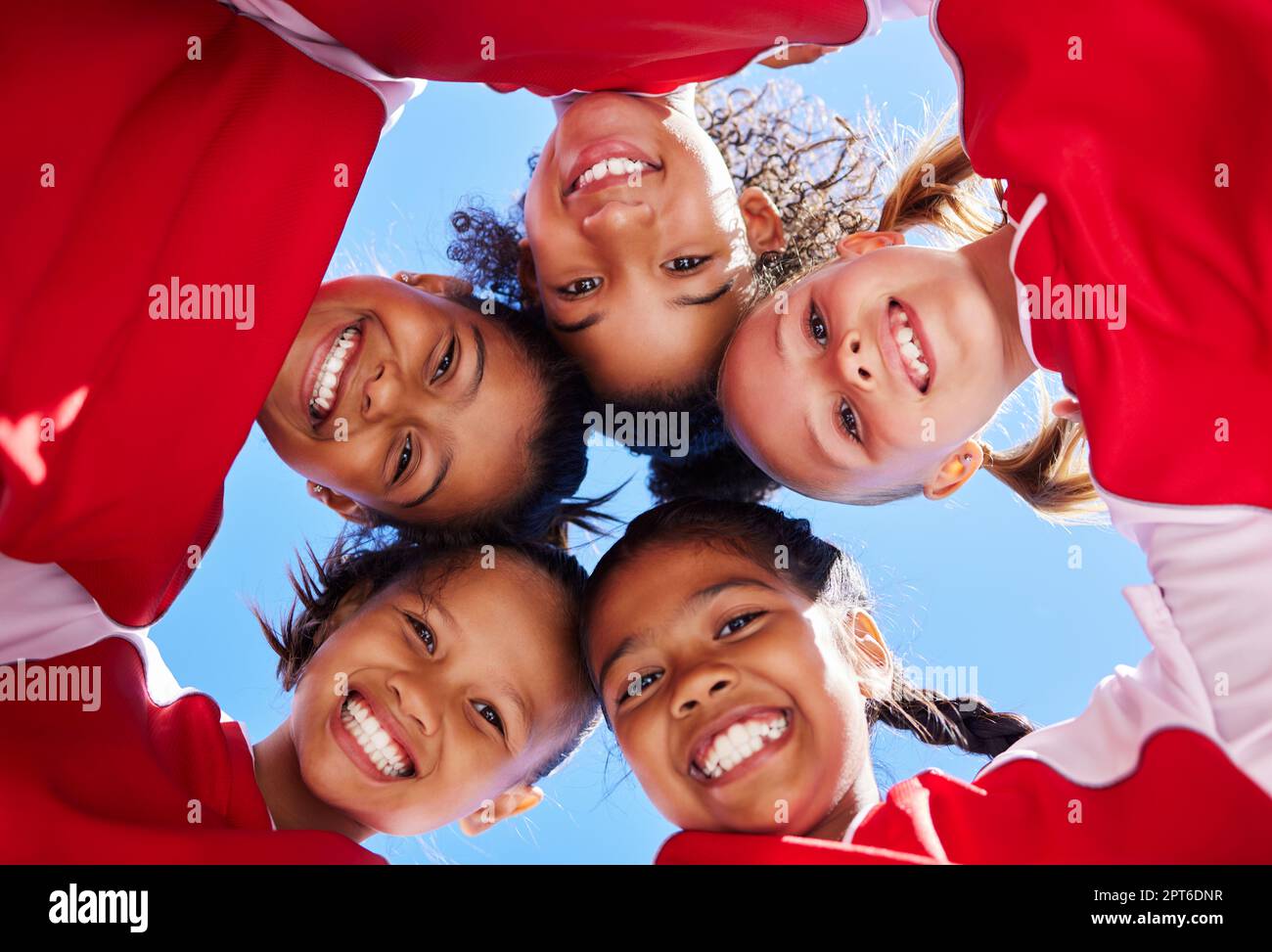 Happy kids huddle hi-res stock photography and images - Alamy
