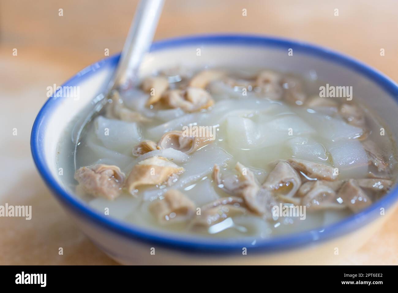 Pork intestine rice flat noodle in restaurant Stock Photo - Alamy