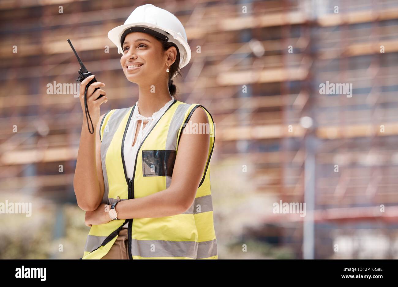 Construction worker, smile and radio with woman for communication in ...