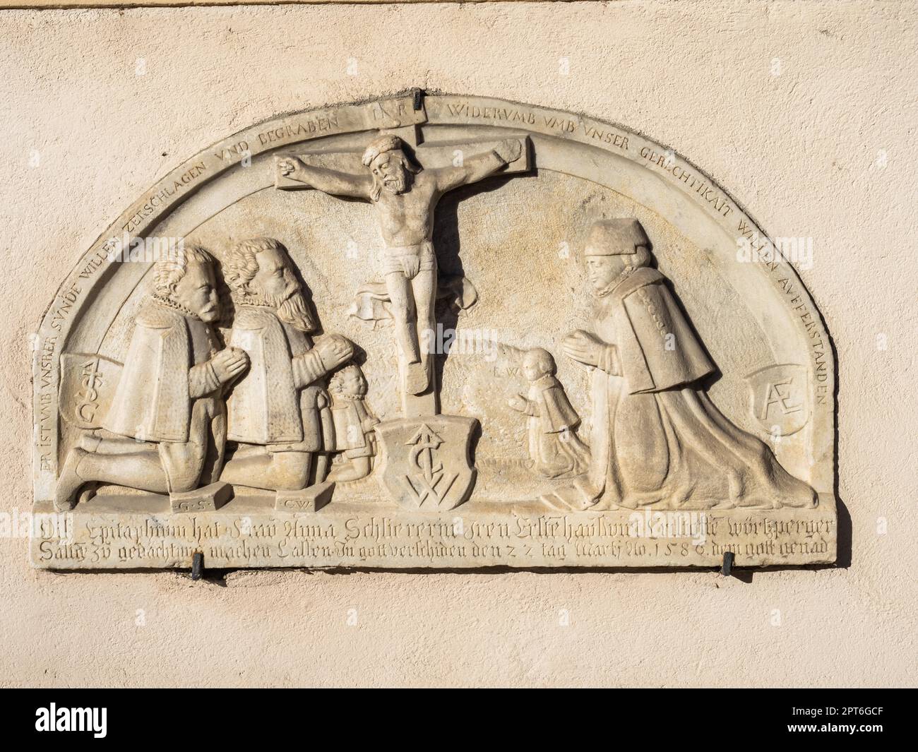 Medieval gravestone, on the exterior facade of St. Michael's Church ...
