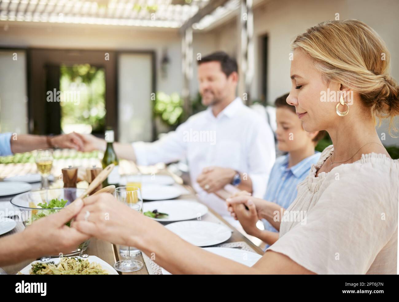 Family meal outside hands hi-res stock photography and images - Alamy