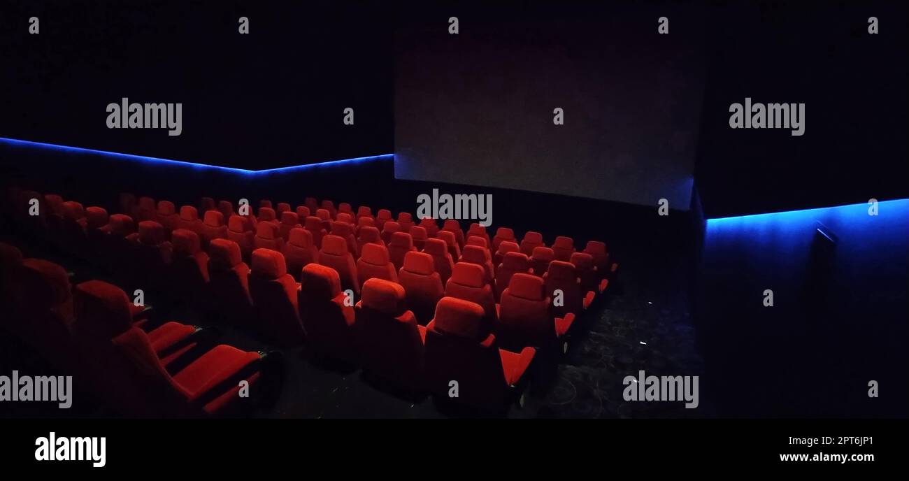 Empty cinema hall with red seats. Interior of modern movie theatre ...