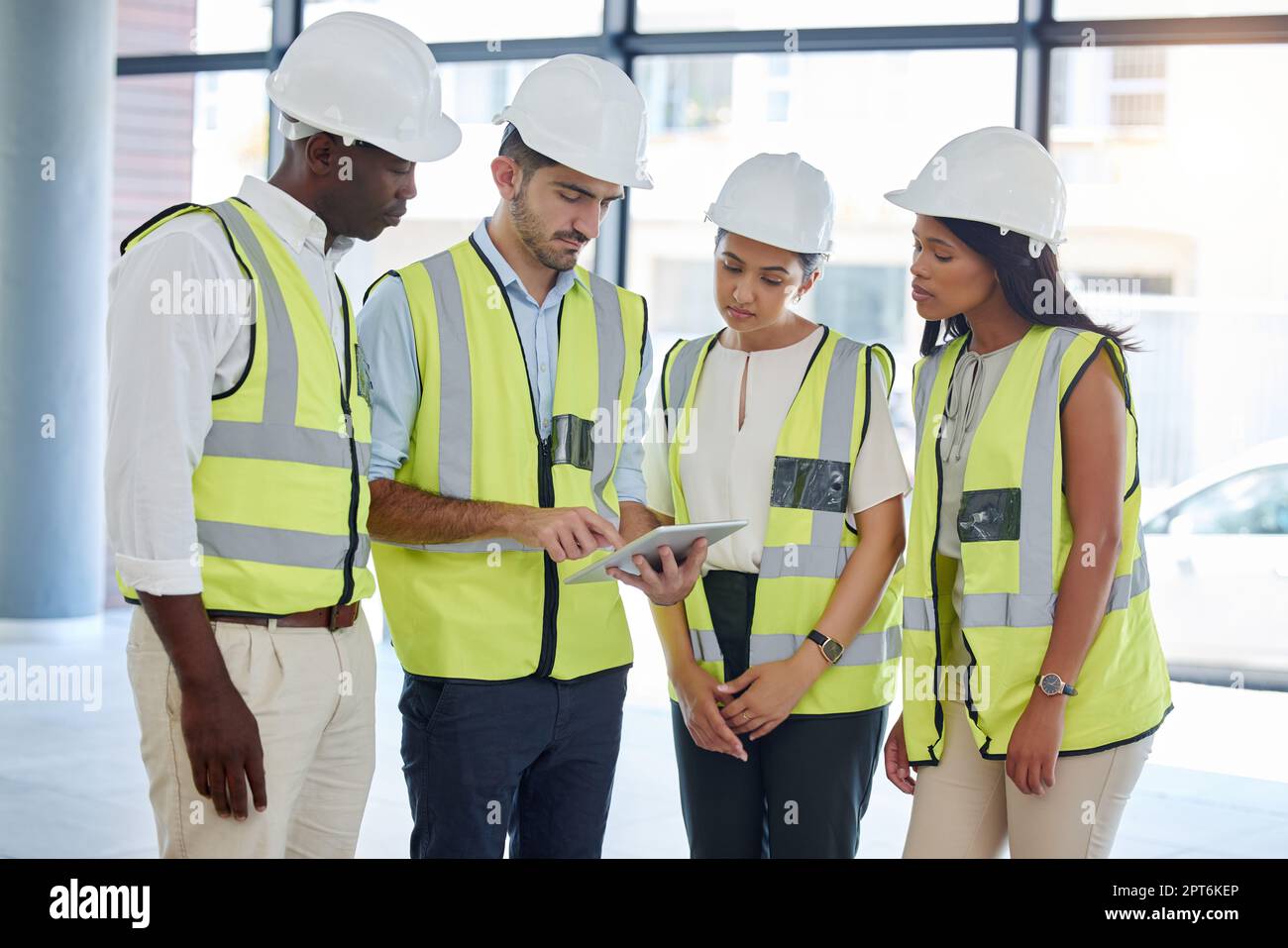 Collaboration, construction and architecture team with tablet working ...