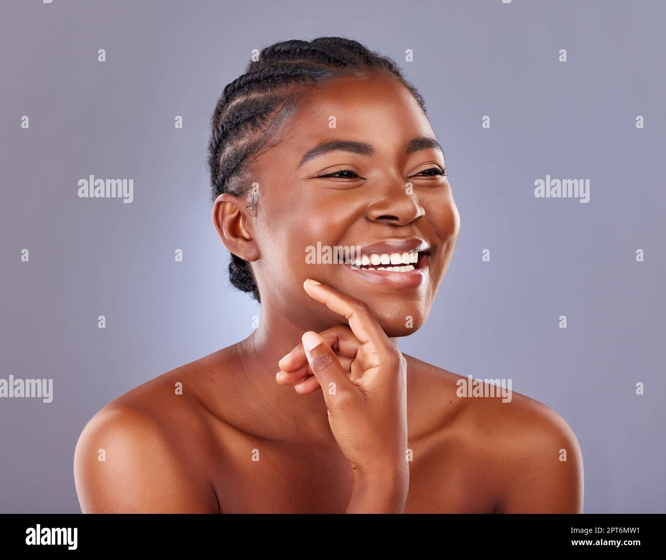 My skin feels amazingly soft. a beautiful young woman posing against a ...