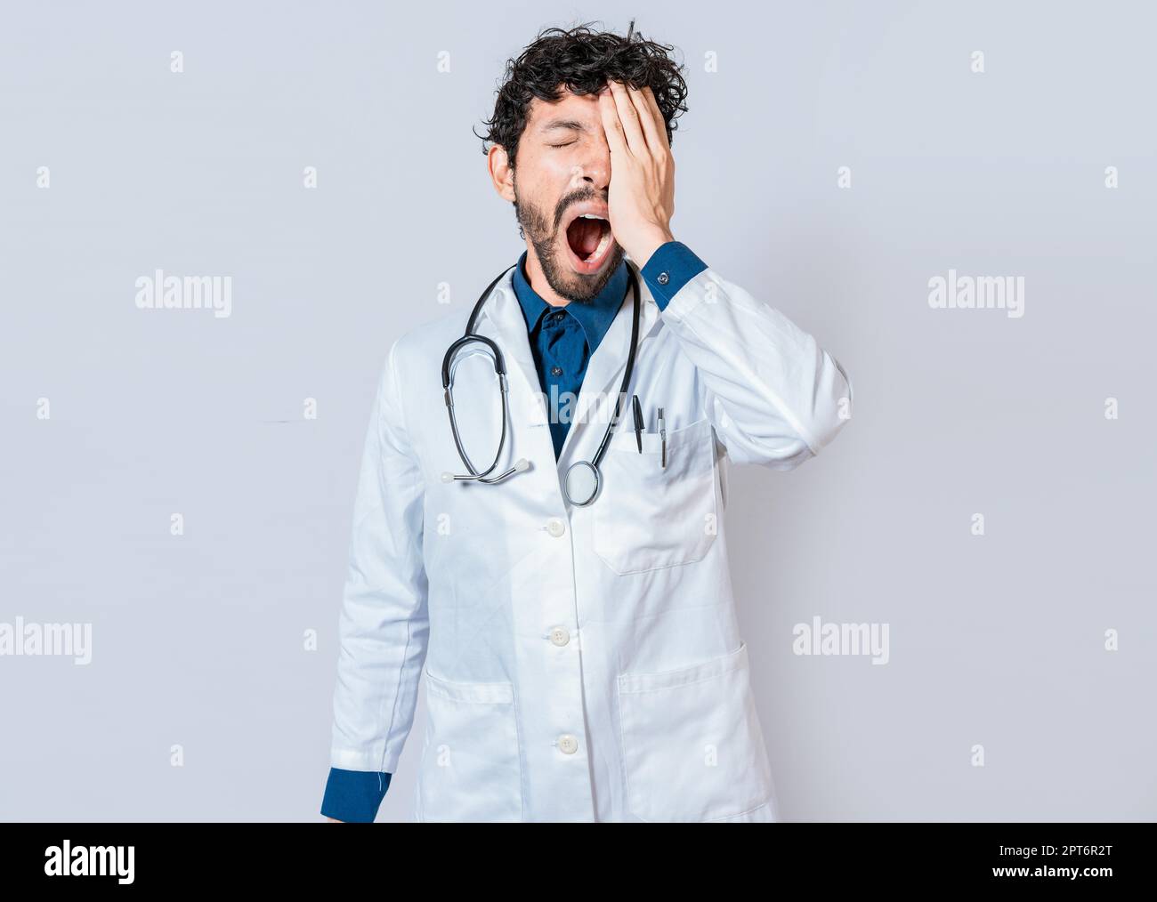 Doctor yawning hi-res stock photography and images - Alamy