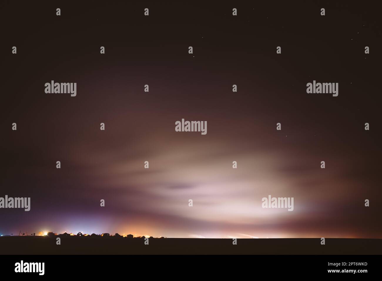 Night Sky With Rare Glowing Stars Shining Through The Cloudiness ...
