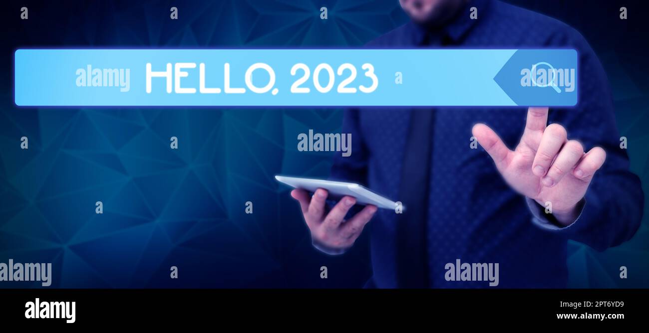 Hand writing sign Hello 2023, Business concept Hoping for a greatness ...