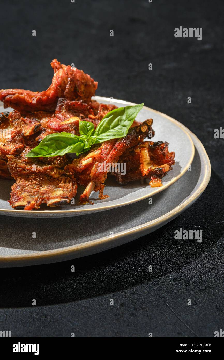 Closeup view of marinated lamb ribs baked in oven Stock Photo - Alamy