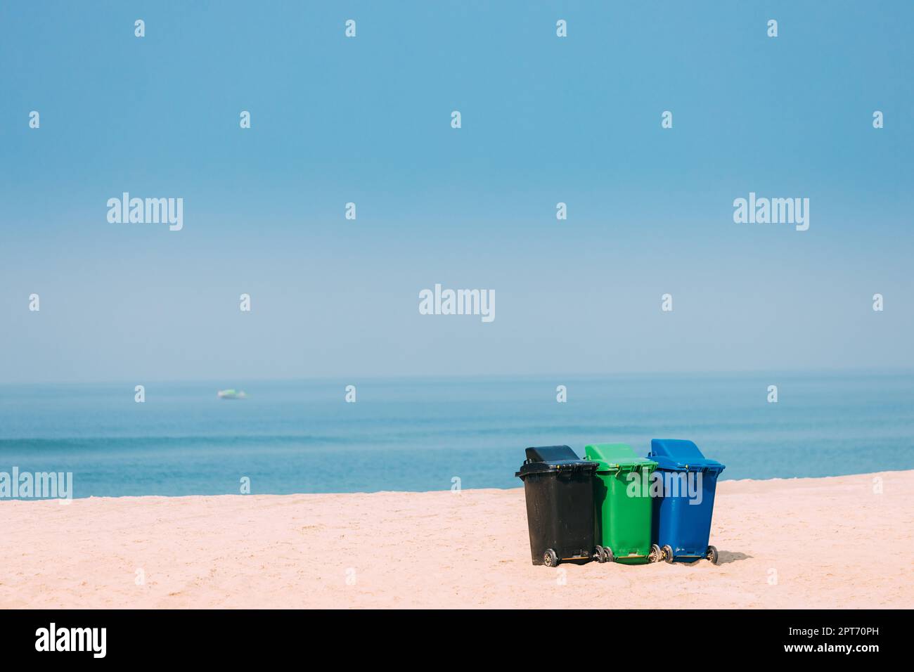 Three Colorful Plastic Waste Containers On Wheels For Separate Collection Of Garbage. Containers ...