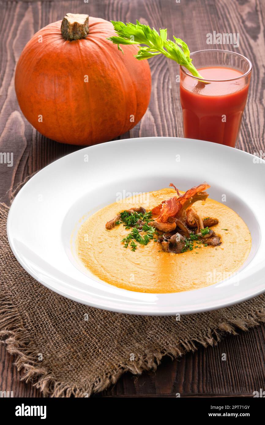 Pumpkin soup puree with bacon Stock Photo - Alamy