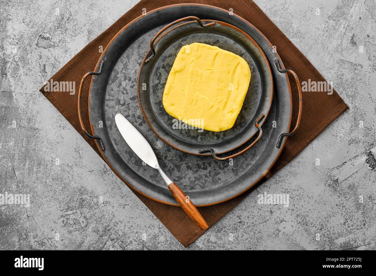 Homemade rustic butter and a spreading knife Stock Photo - Alamy