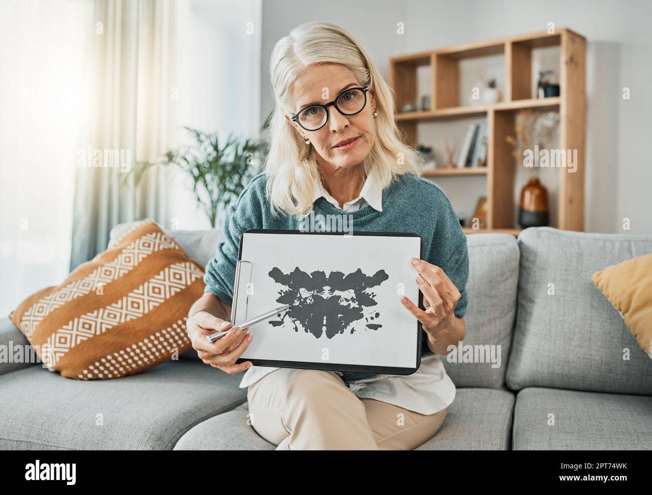 Inkblot test, therapy and psychologist woman in portrait for mental ...