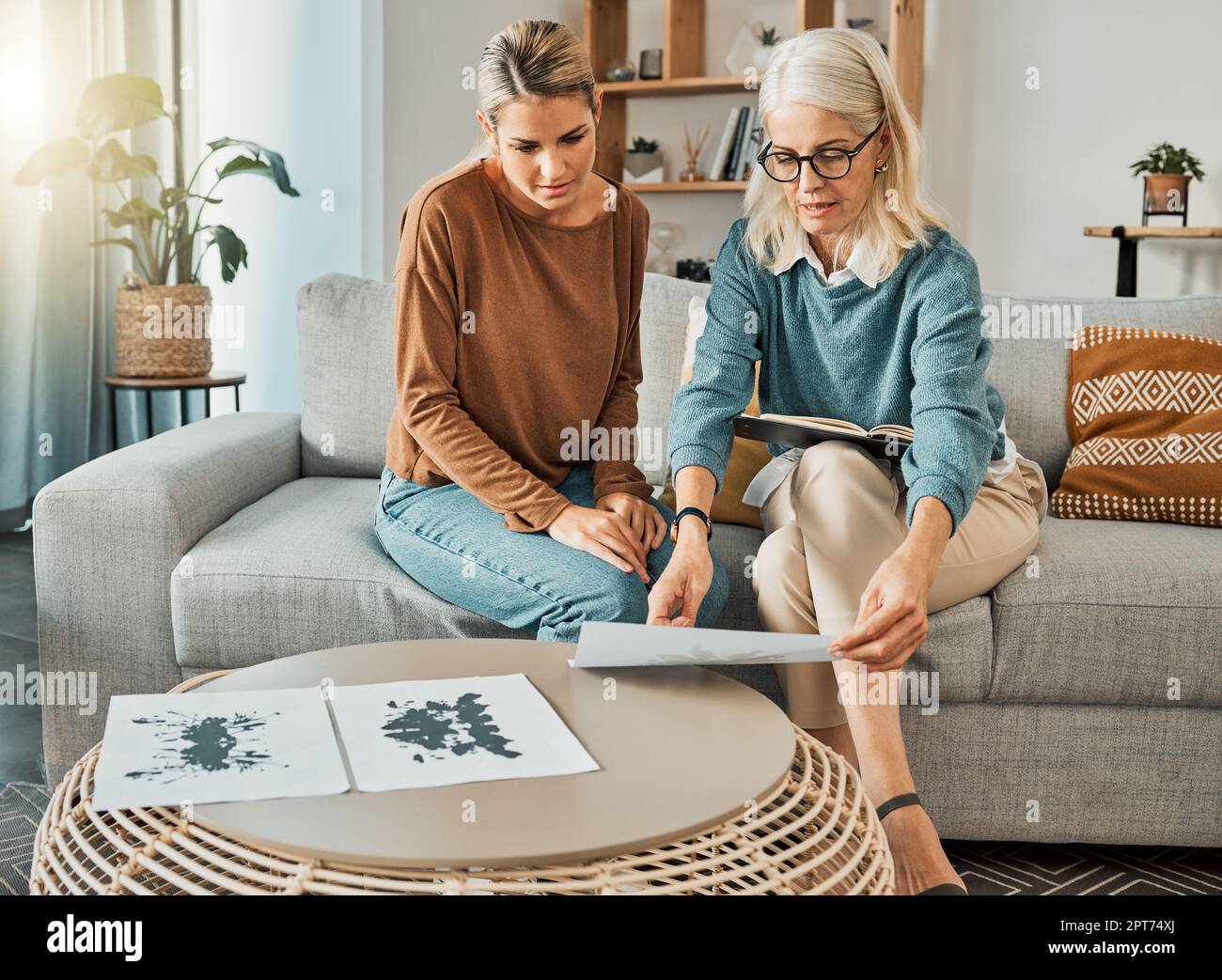 Inkblot test, therapy and woman with psychologist for mental health ...