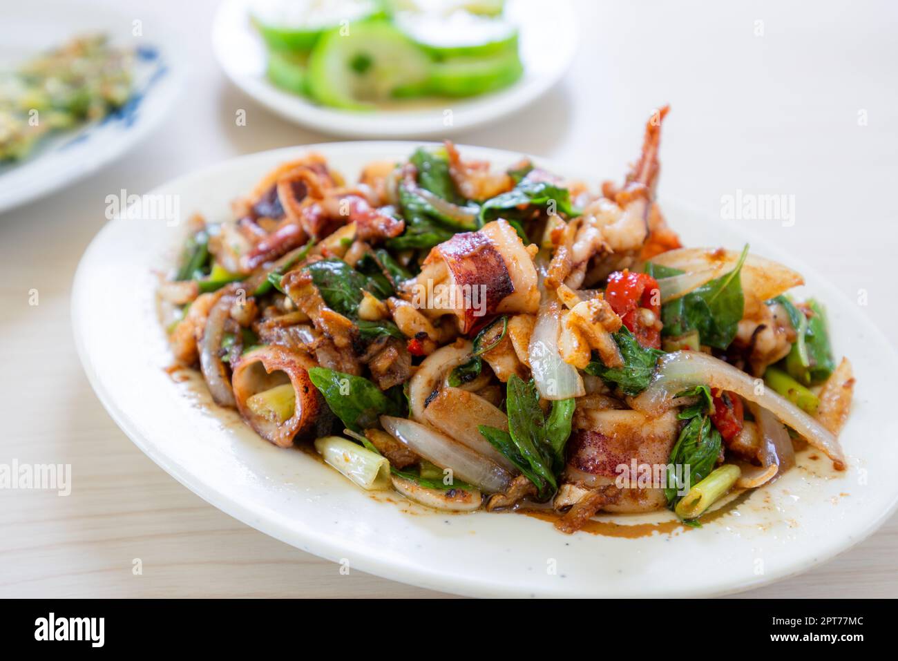 Fried squid dish seafood in Taiwan Stock Photo - Alamy