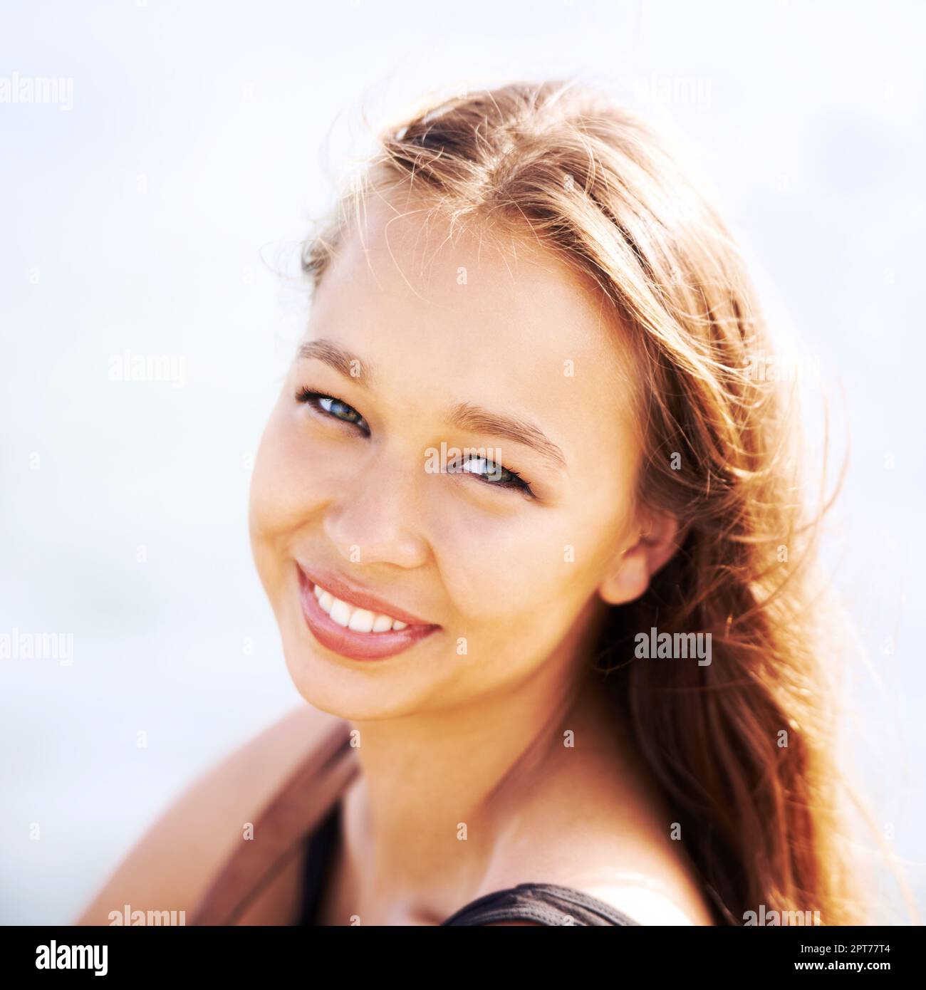 Letting Her Hair Down Portrait Of A Beautiful Young Woman Smiling
