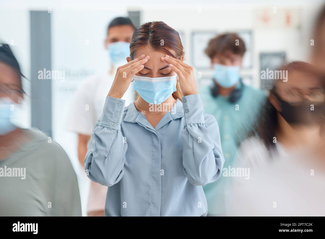 Covid, headache and business woman in mask in busy work environment ...