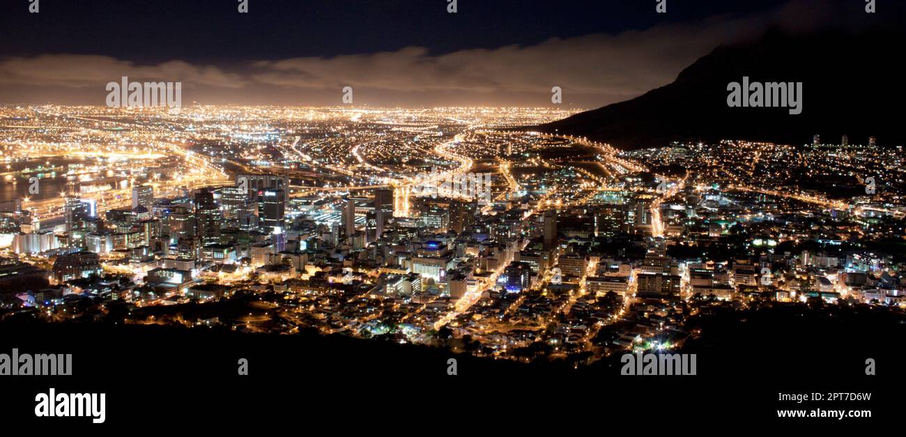 The city comes alive at night. View of a city landscape at night Stock ...