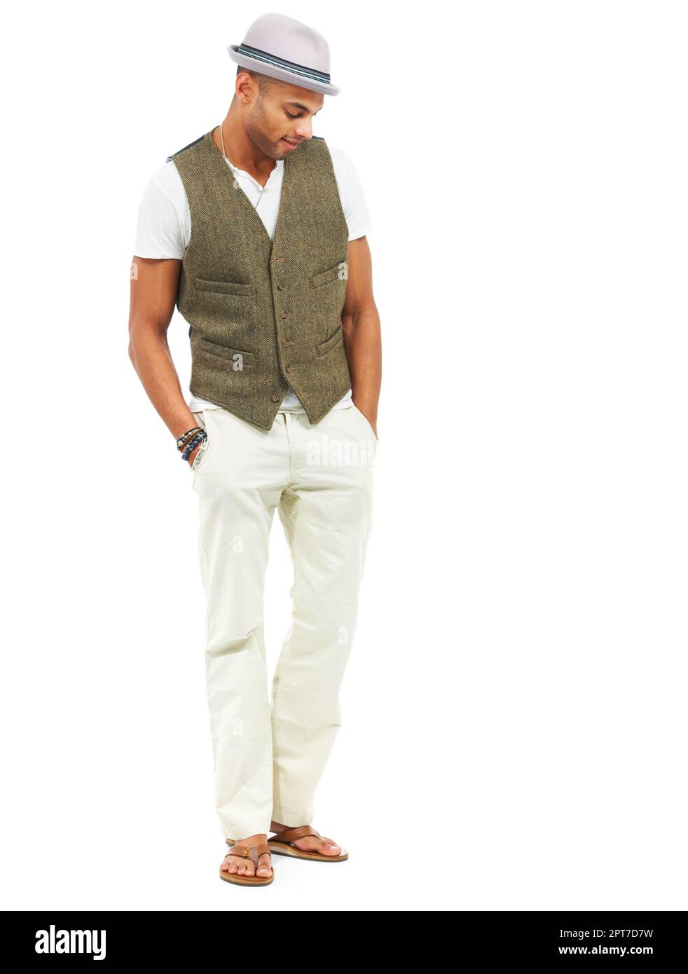 Message for introvert. Trendy young man looking shyly down at the ...