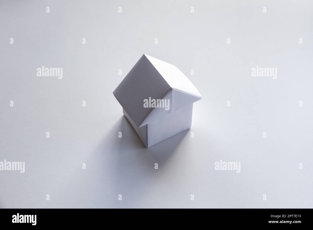Paper house origami isolated on a blank white background Stock Photo ...