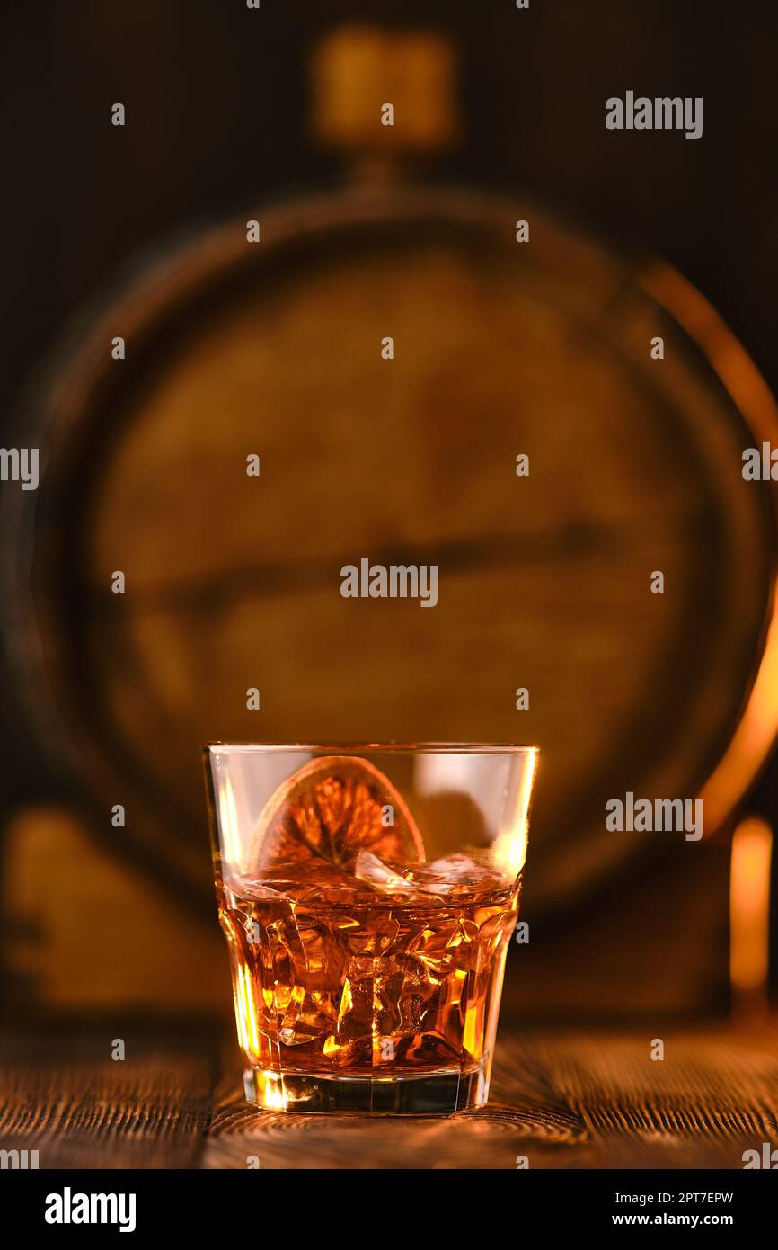 Cocktail old fashioned with barrel on background Stock Photo - Alamy