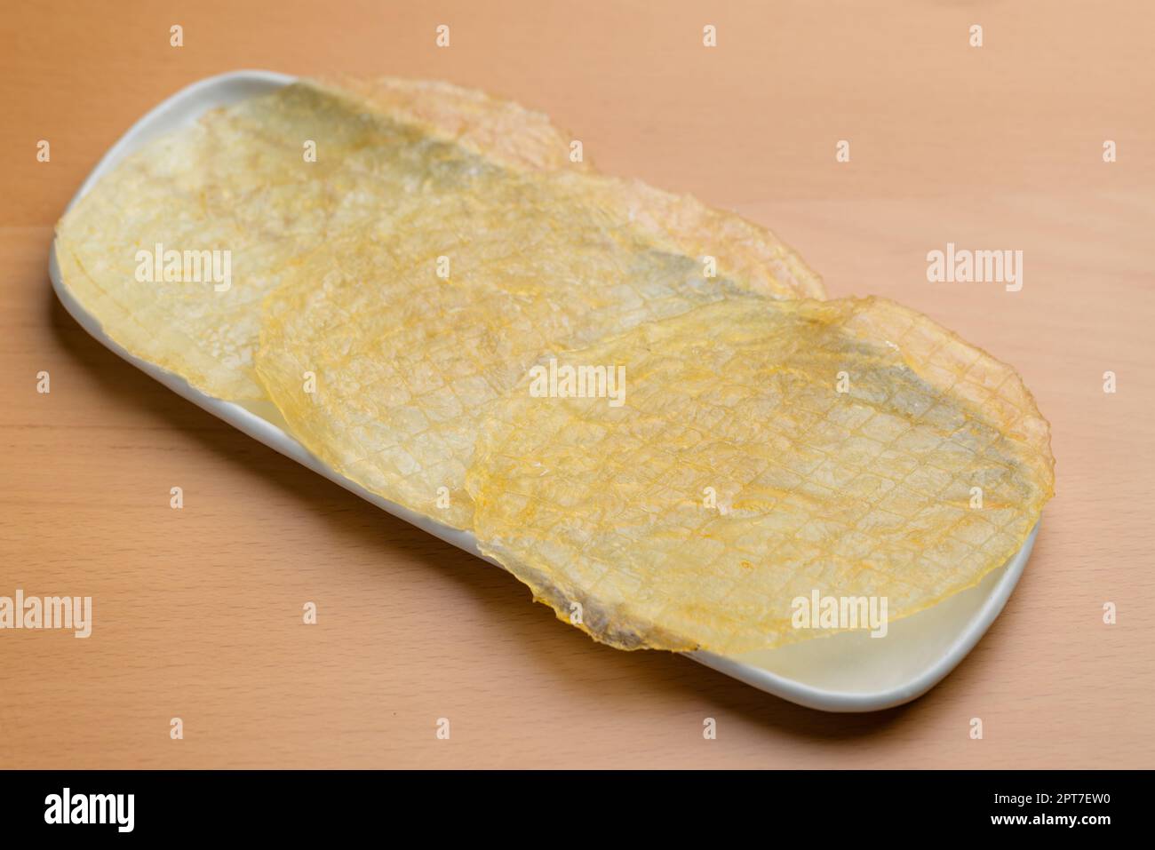 Dried fish fillet seafood cuisine Stock Photo - Alamy