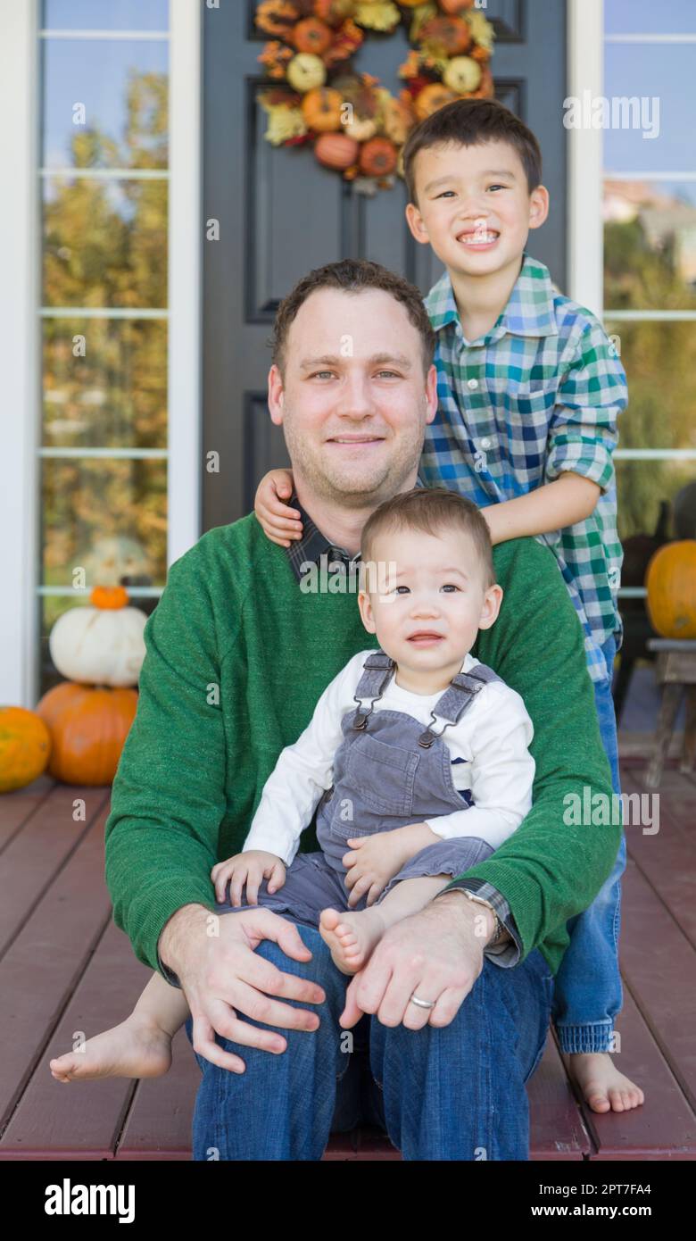 Young Mixed Race Chinese and Caucasian Father with His Sons Stock Photo ...