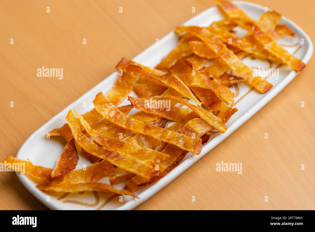 Cooked dried fish fillet snack Stock Photo - Alamy