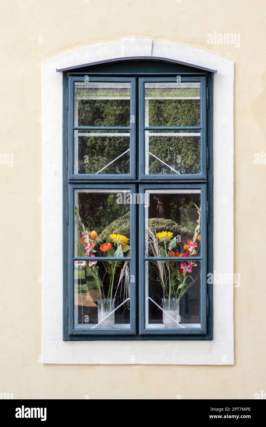 Window of a romantic and colorful house with flower pots Stock Photo ...